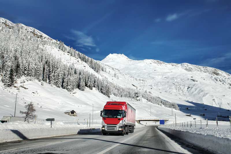 bigstock-truck-running-on-highway-and-b-12157181 - Construction Canada