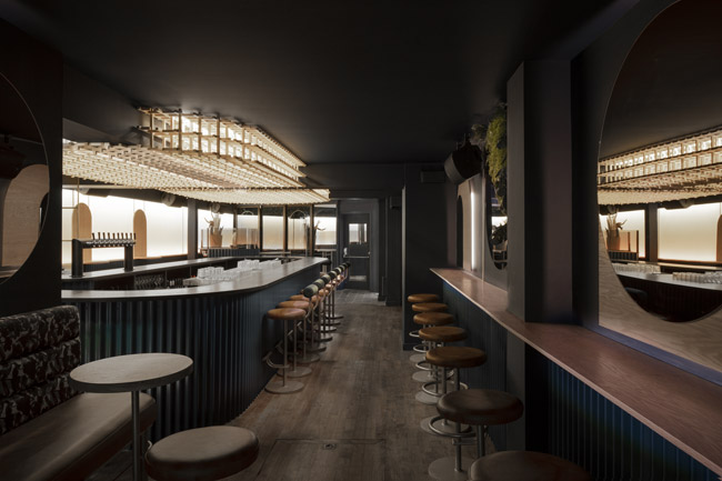 Montréal bar uses lighting and acoustics to create a ‘warmly glacial ...